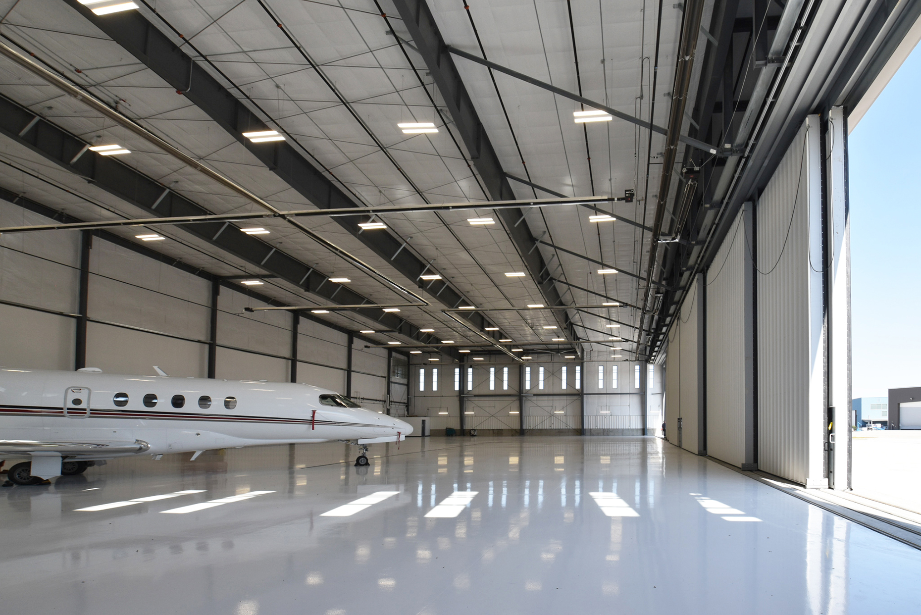 Floors and Doors Hangar - dcb Construction Company